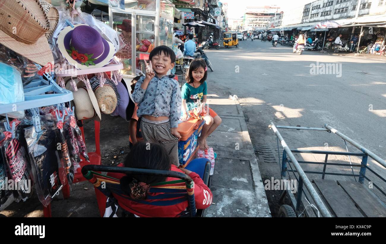 Little Boy With Big Smile Giveing the Peace Sign Street Vendor Scene ...