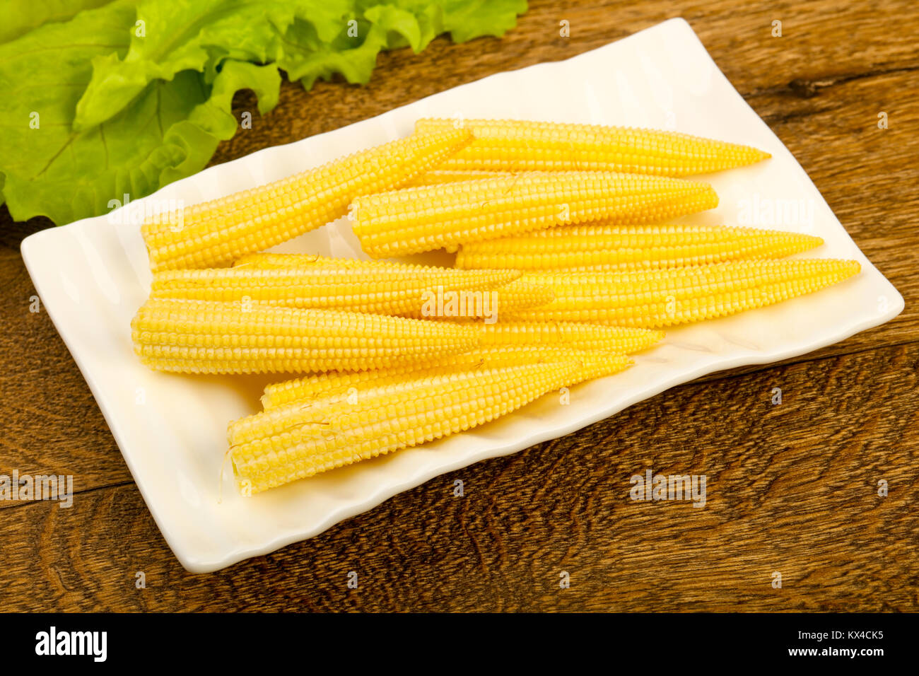 Young raw baby corn Stock Photo - Alamy
