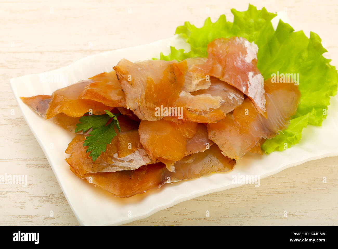Smoked catfish fillet carpaccio Stock Photo - Alamy