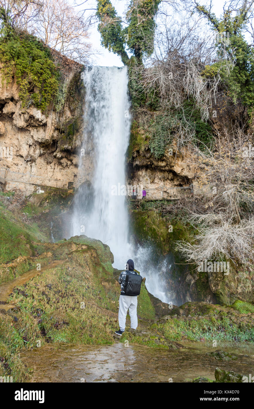 People Enjoying The Force Of The 70 Meters Tall Waterfall In Edessa People Enjoying The Force Of The 70 Meters Tall Waterfall In Edessa