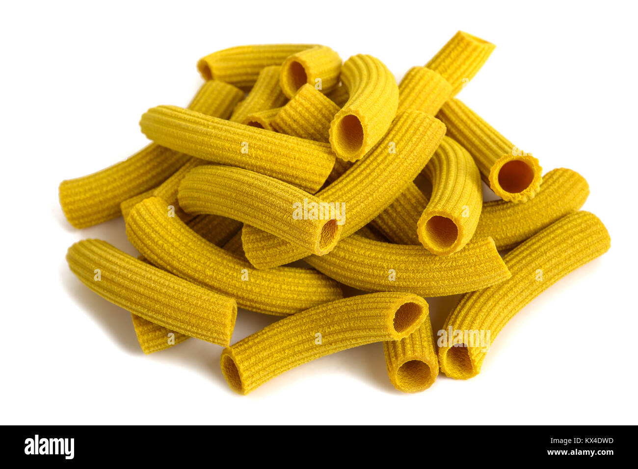 saffron yellow macaroni isolated on white background Stock Photo - Alamy