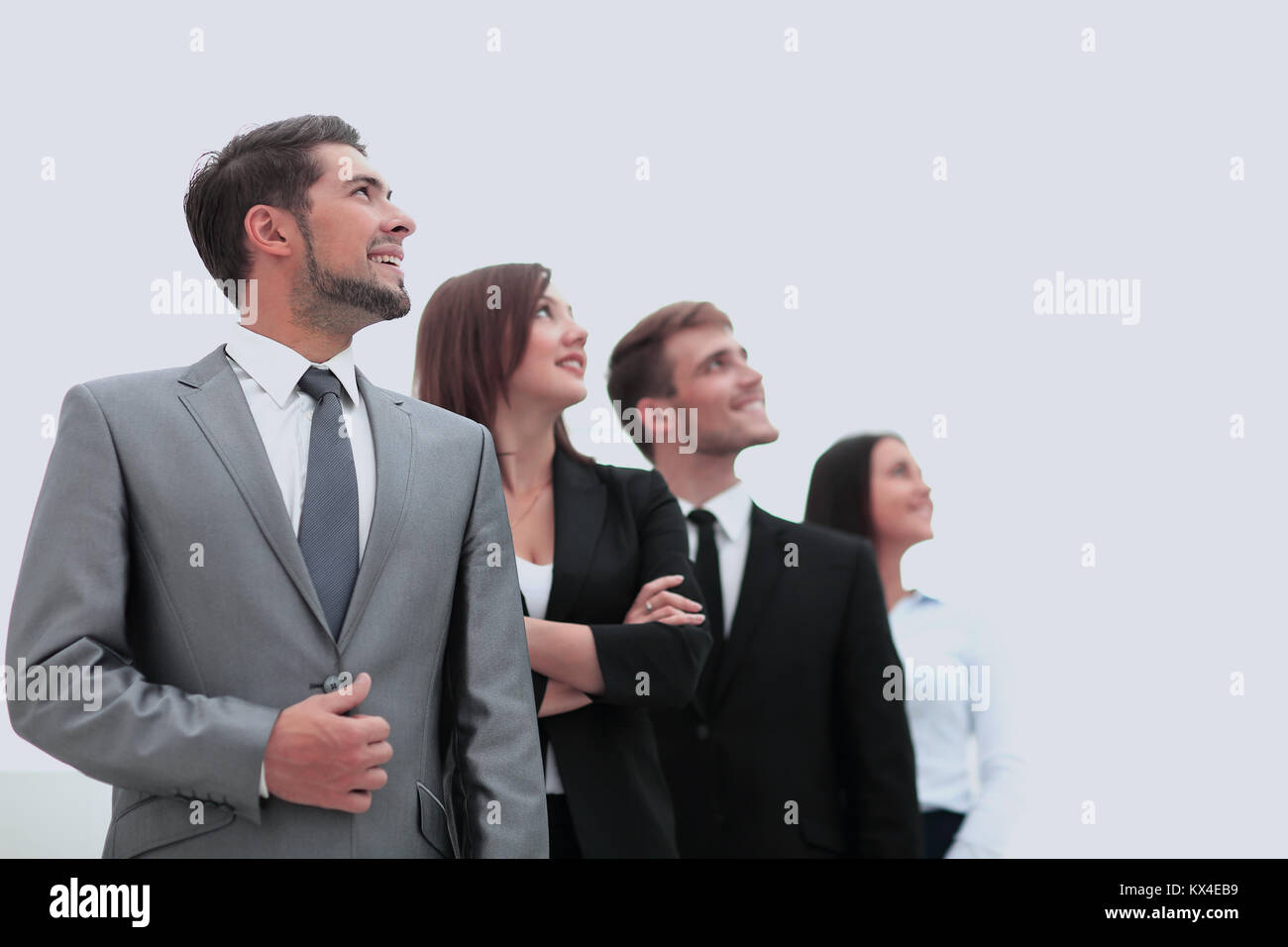 Smiling employee's in a line at work Stock Photo - Alamy
