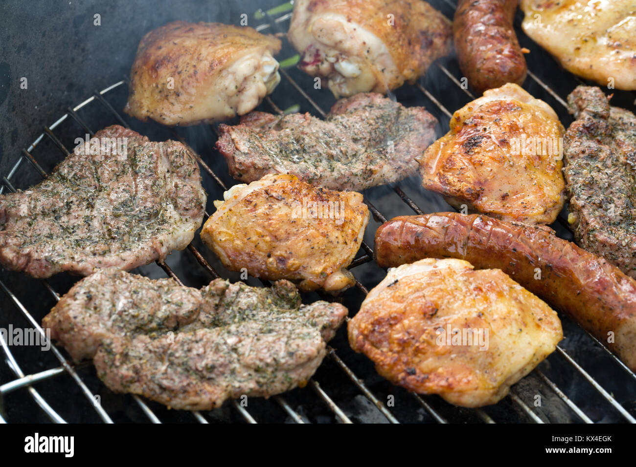 barbecue with delicious grilled meat on grill Stock Photo - Alamy
