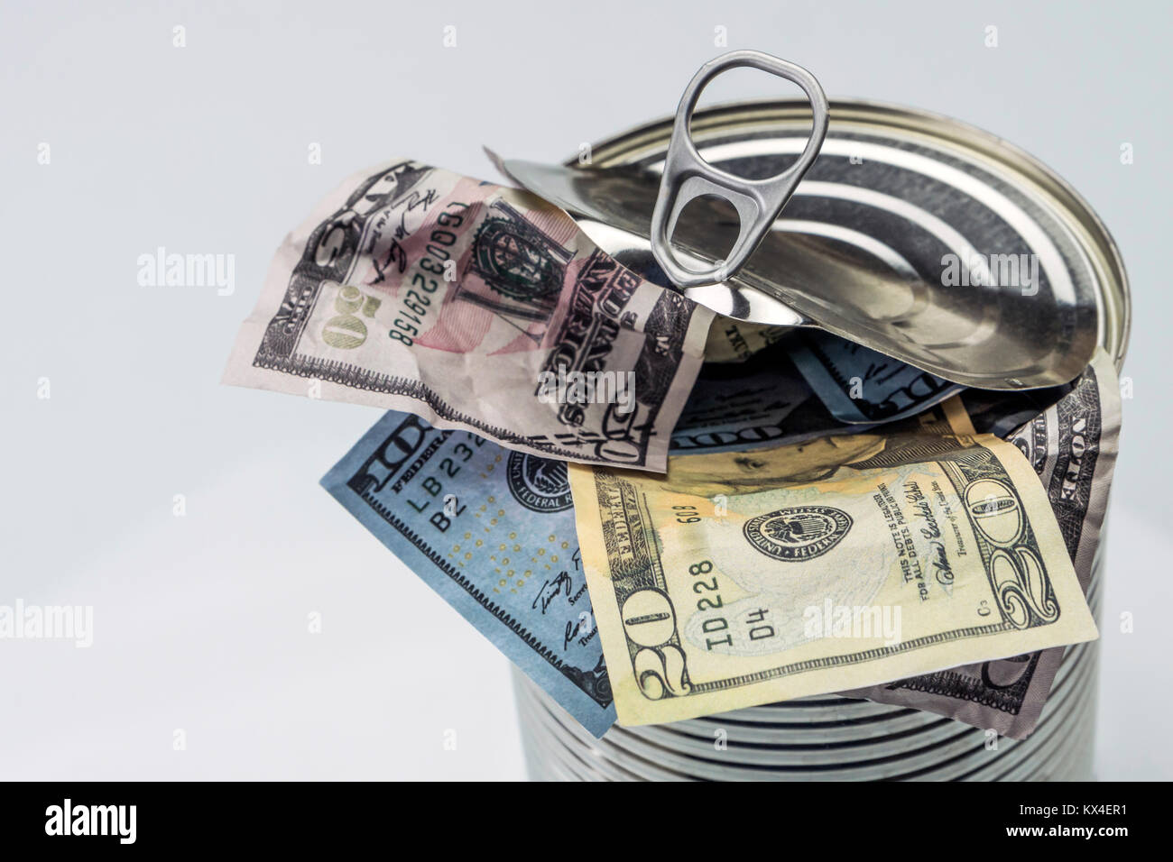 Money cans hi-res stock photography and images - Alamy