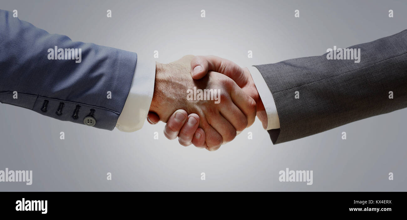 handshake of business partners after signing promising contract Stock ...