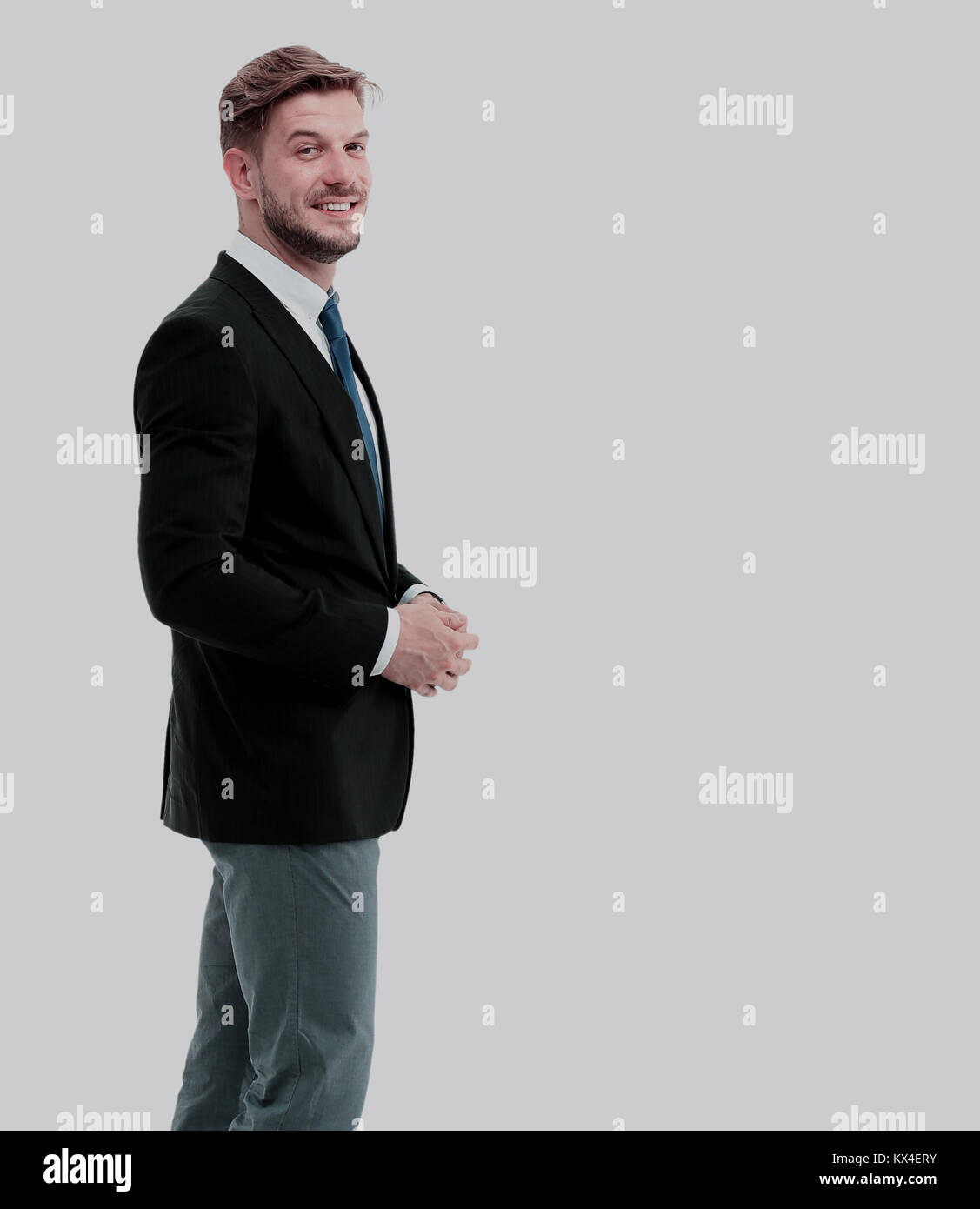 Side view of a smiling businessman, On white background Stock Photo - Alamy