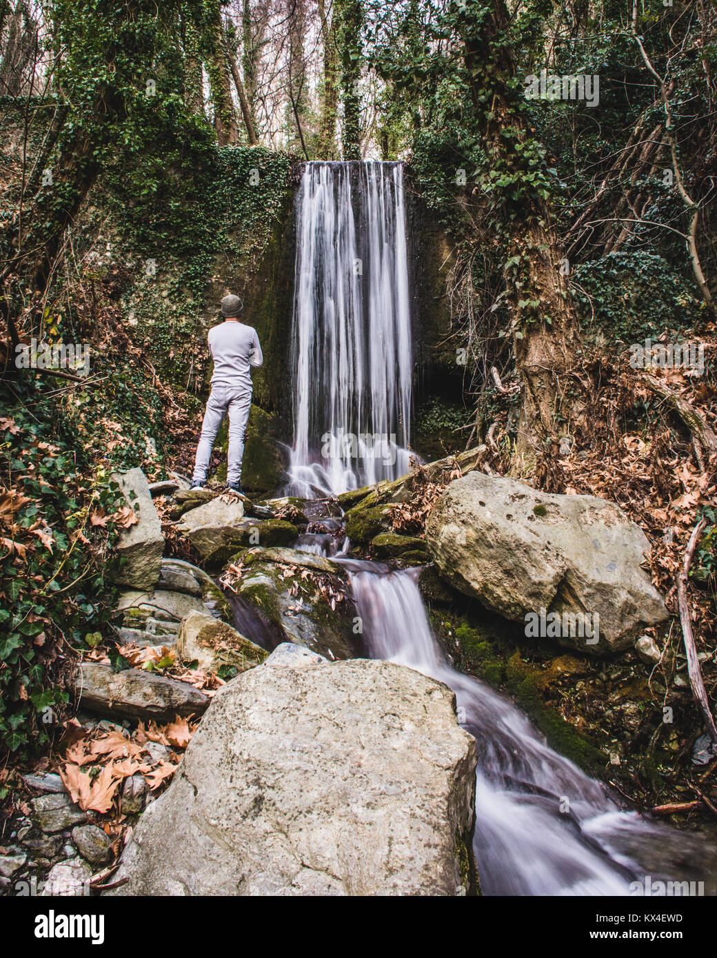 Man looking at a waterfall hi-res stock photography and images - Alamy