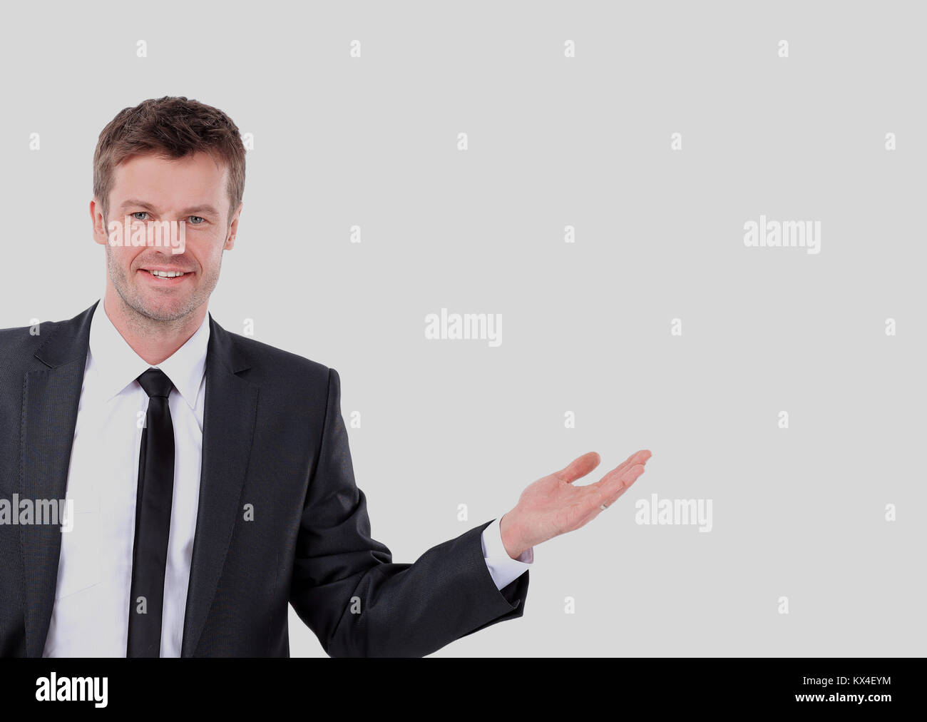 Happy smiling business man showing blank area for sign or copysp Stock ...