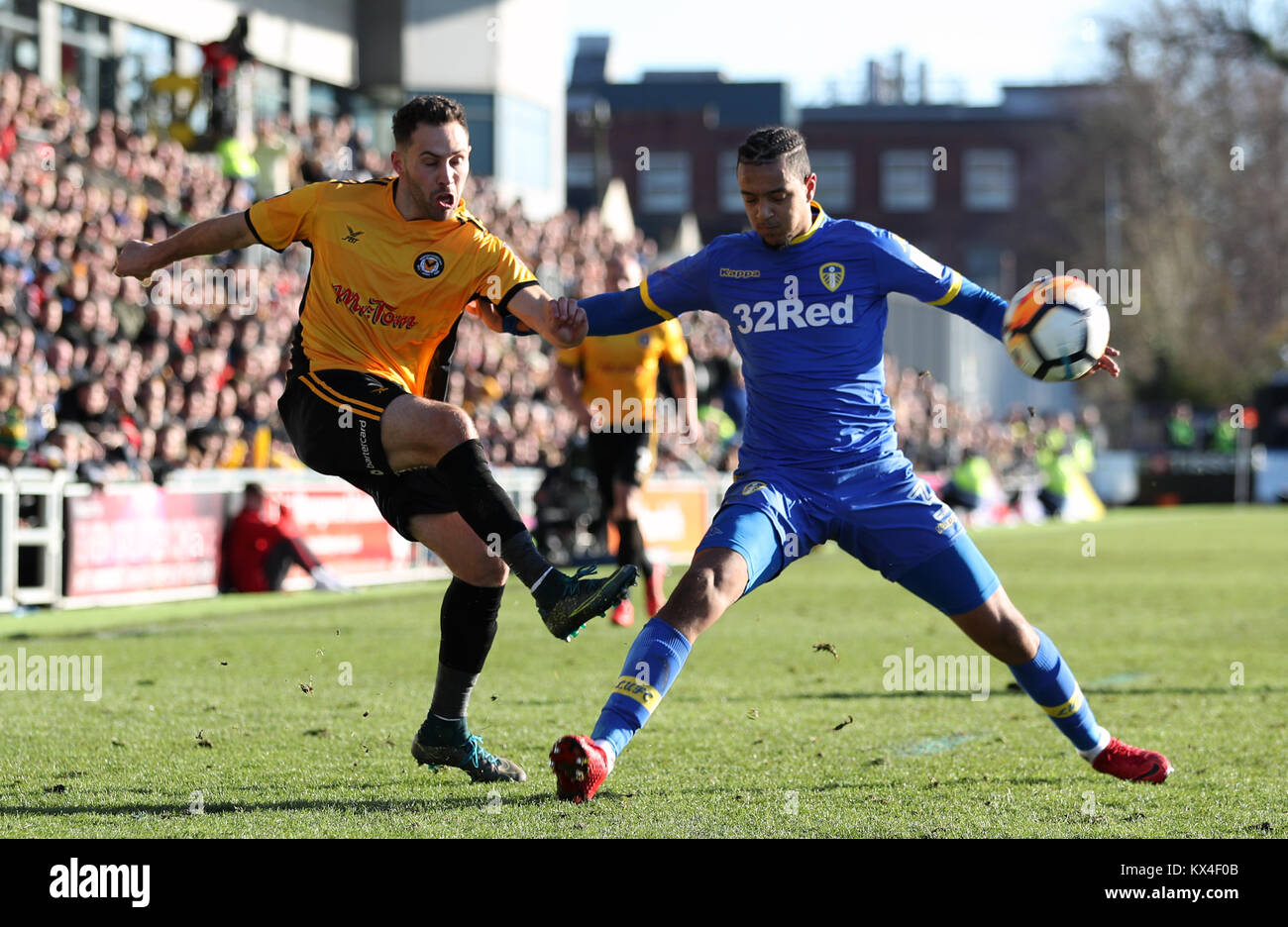 Newport County's Robbie Willmott (left) and Leeds United's Cameron ...