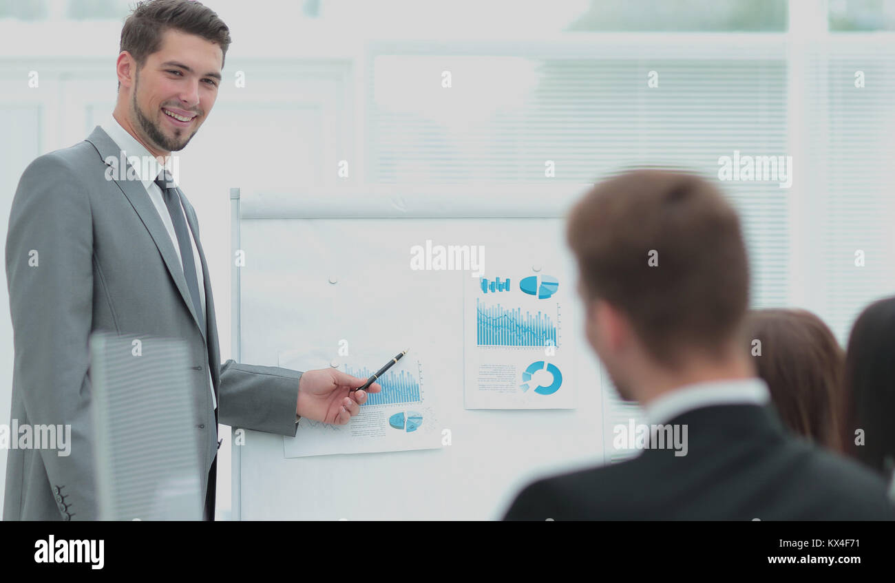 Business man asking question during his colleagues presentation Stock ...