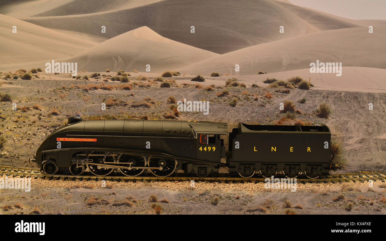 An A4 Pacific Model train set on a scenic landscape Stock Photo - Alamy