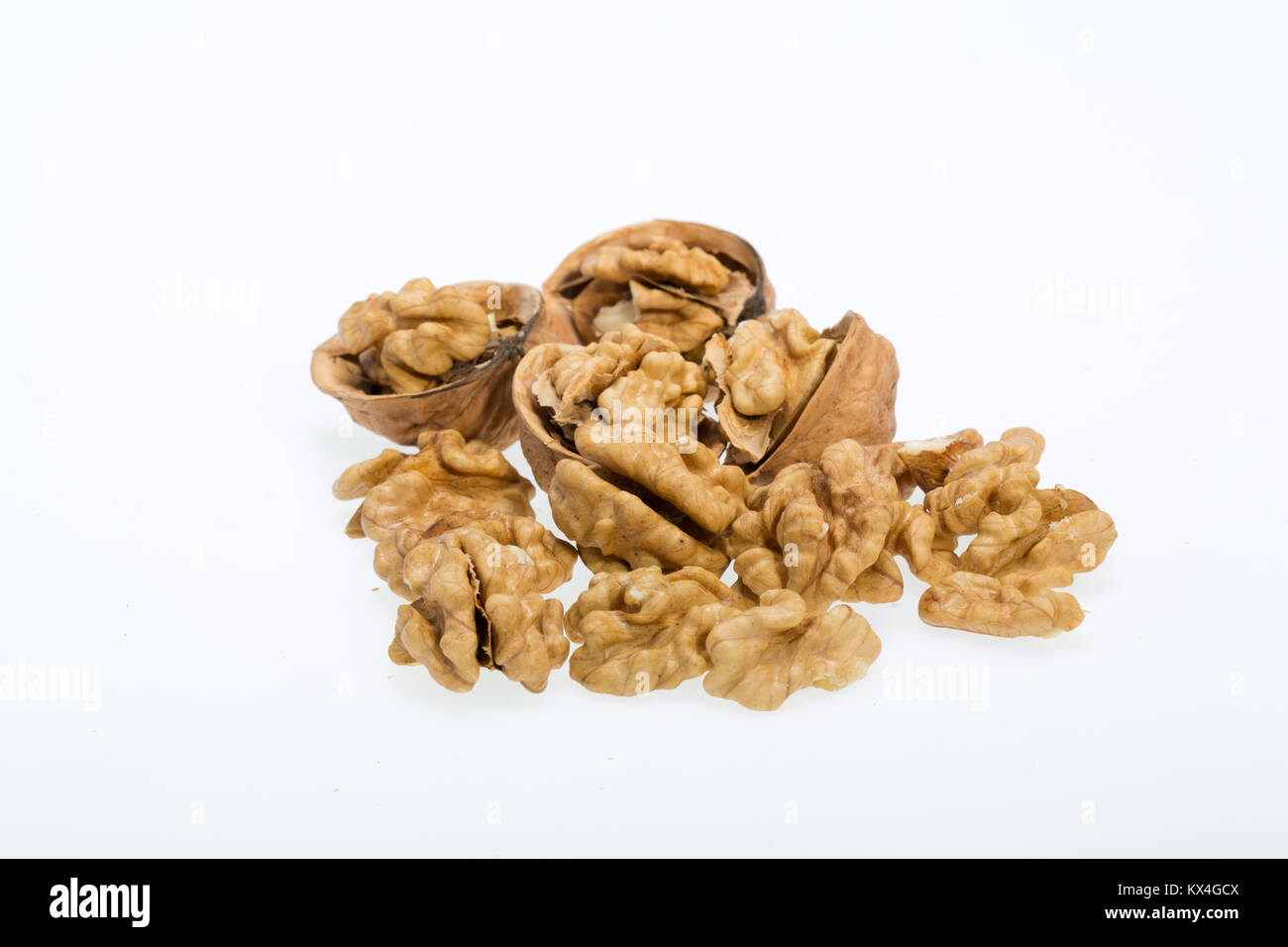 cracked walnut isolated on the white background Stock Photo - Alamy