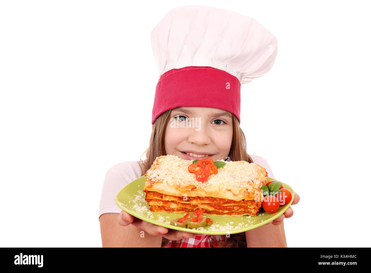 happy little girl cook with lasagne Stock Photo - Alamy