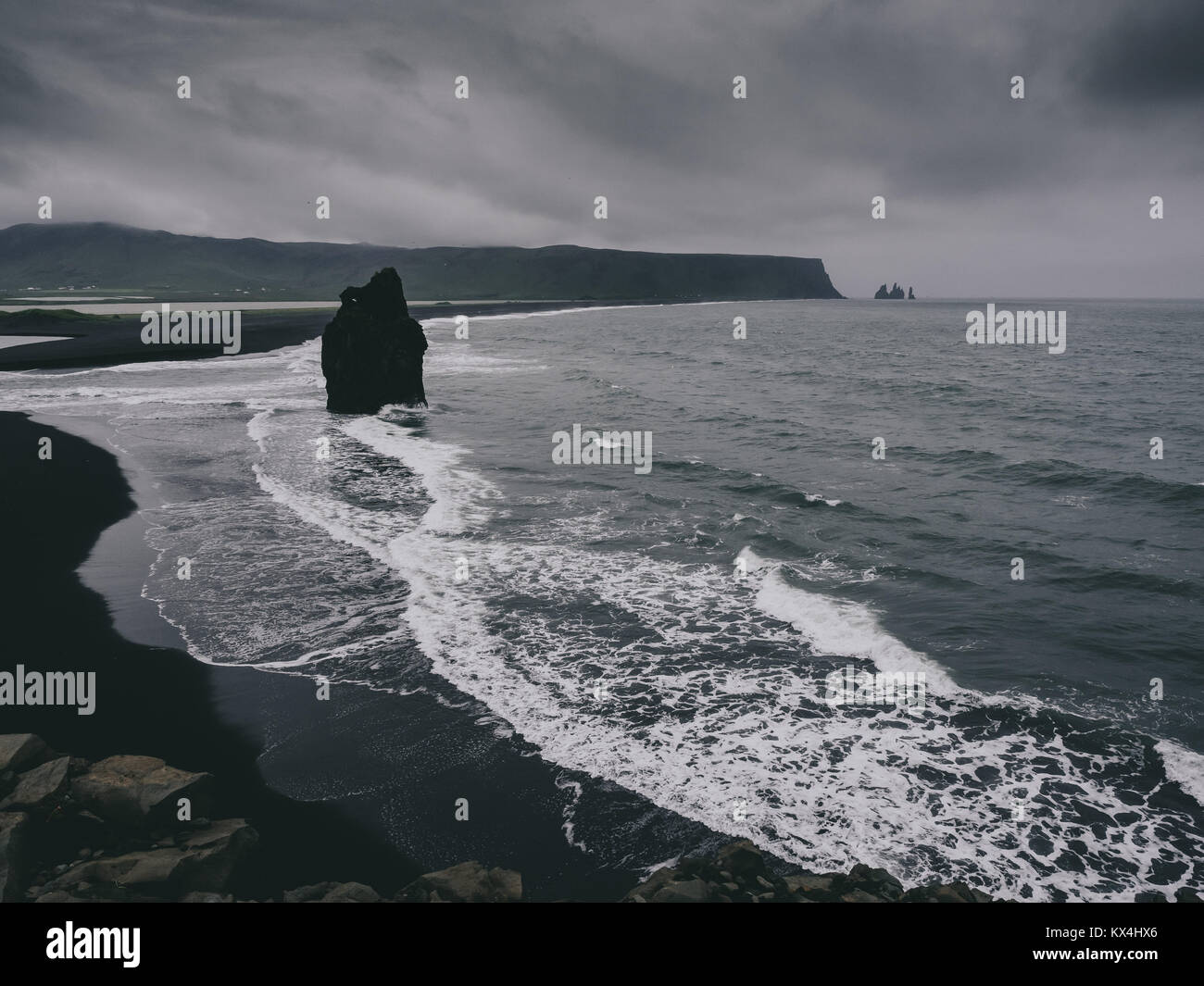 Black sand beach with rocks, Vik, Iceland Stock Photo - Alamy