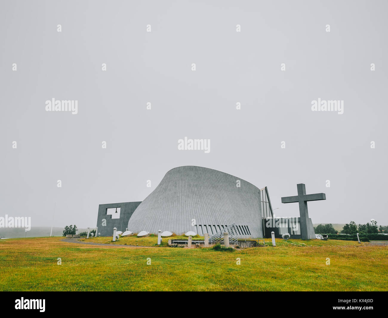 Modern church, concrete construction, with a large cross, new parish ...