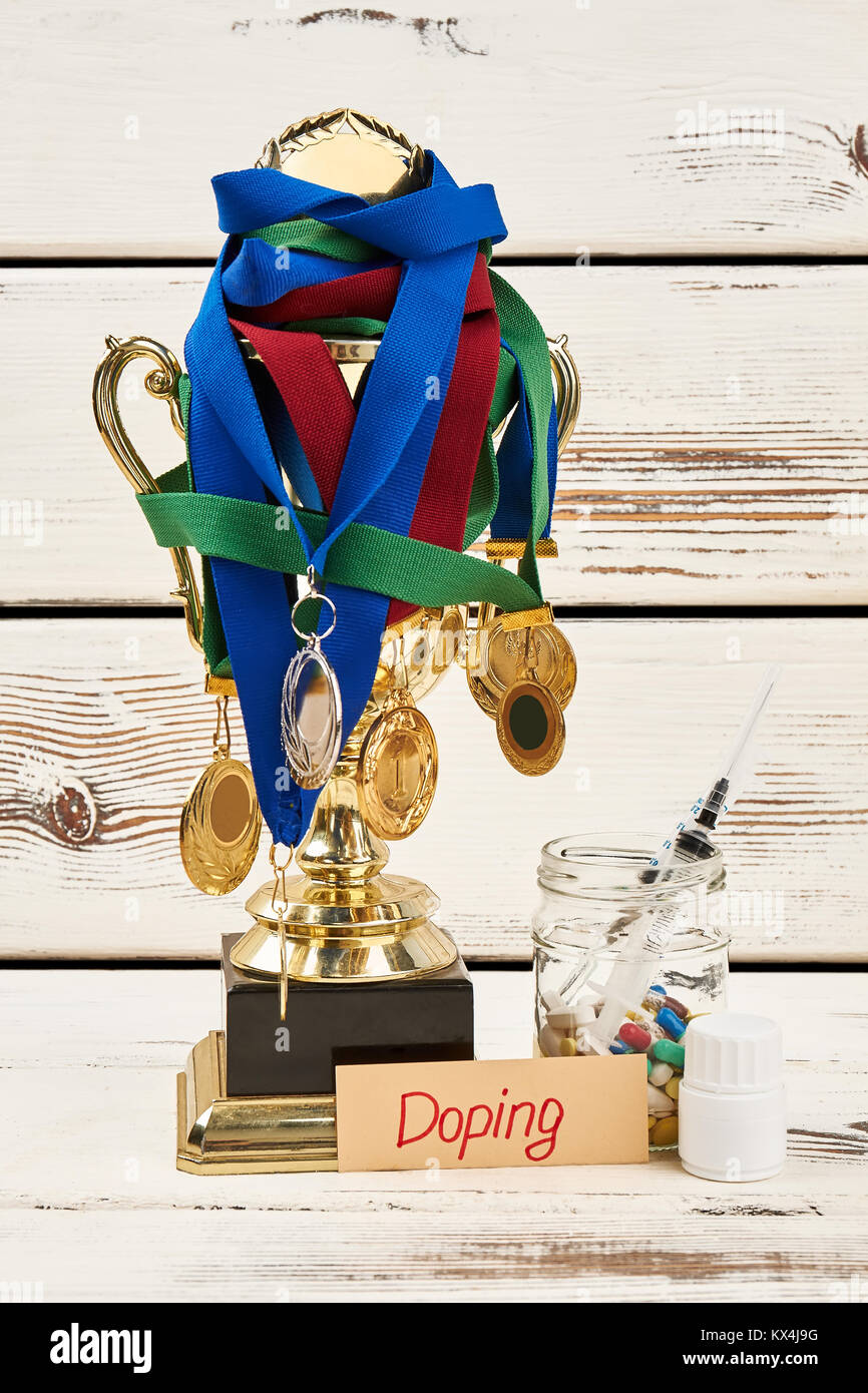 Medals, trophy and doping drugs Stock Photo - Alamy