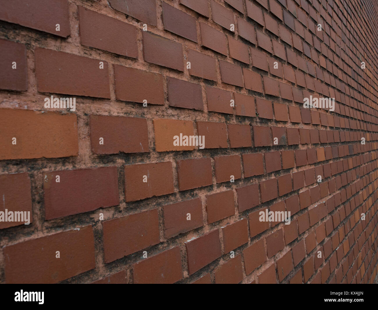 Perfect red brick wall hi-res stock photography and images - Alamy
