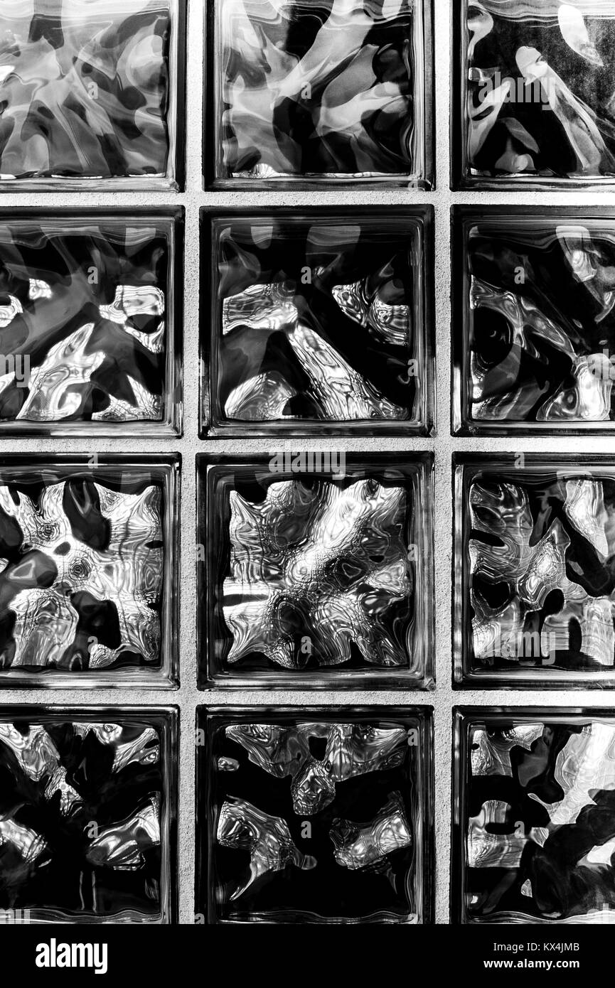 Light reflecting off thick glass into abstract shapes and shadows Stock ...