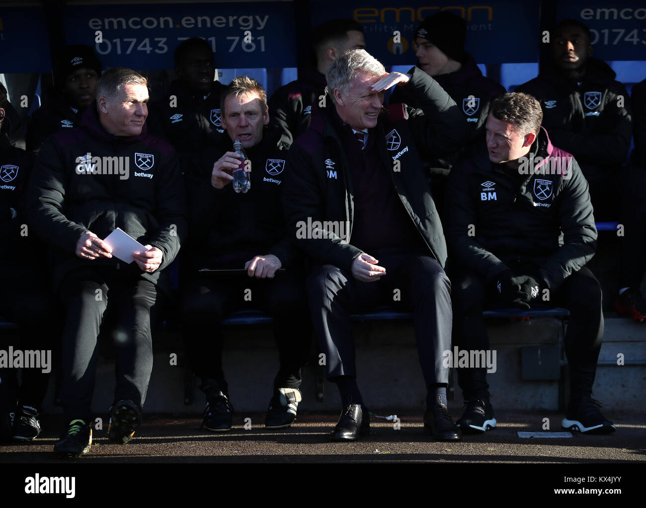 The West Ham United bench (left-right) Chris Wood, Stuart Pearce ...
