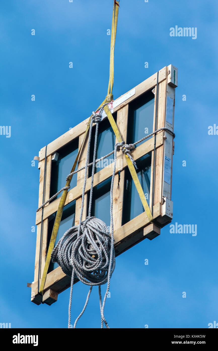 Crane lifting wooden frame hi-res stock photography and images - Alamy