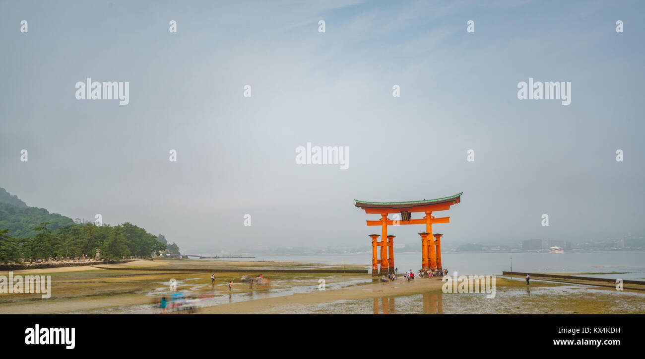 Long exposure with tourists in Miyajima with low tide, Japan Stock ...