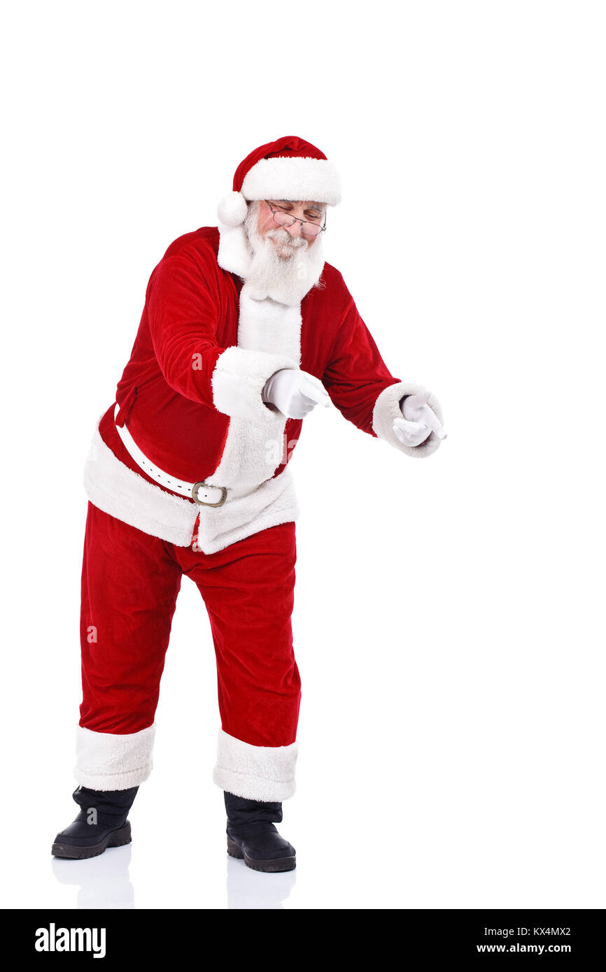 Santa Claus pointing with both hands in copy space, isolated on white ...