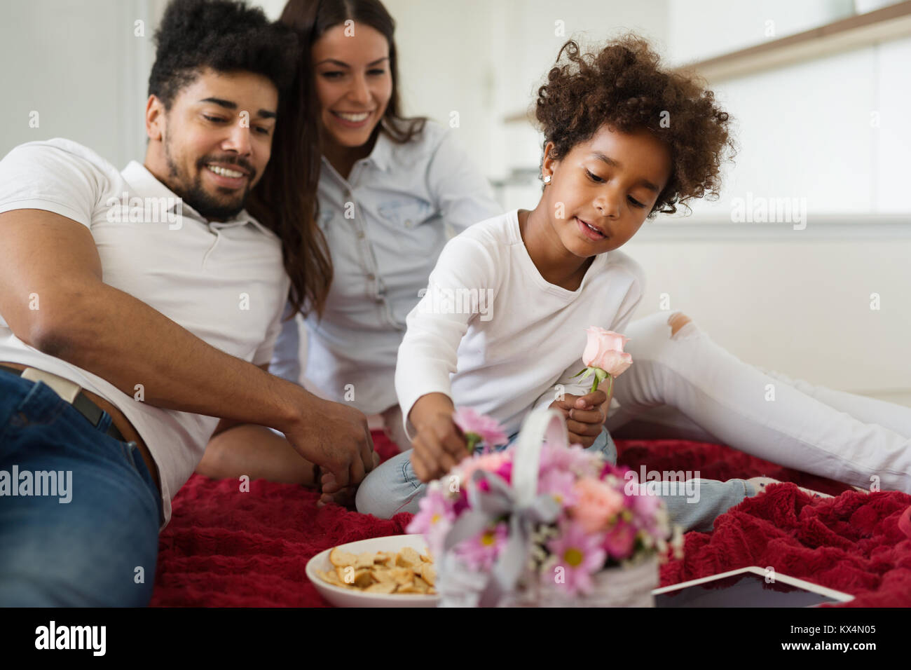 Picture of happy family having wonderful time together Stock Photo - Alamy