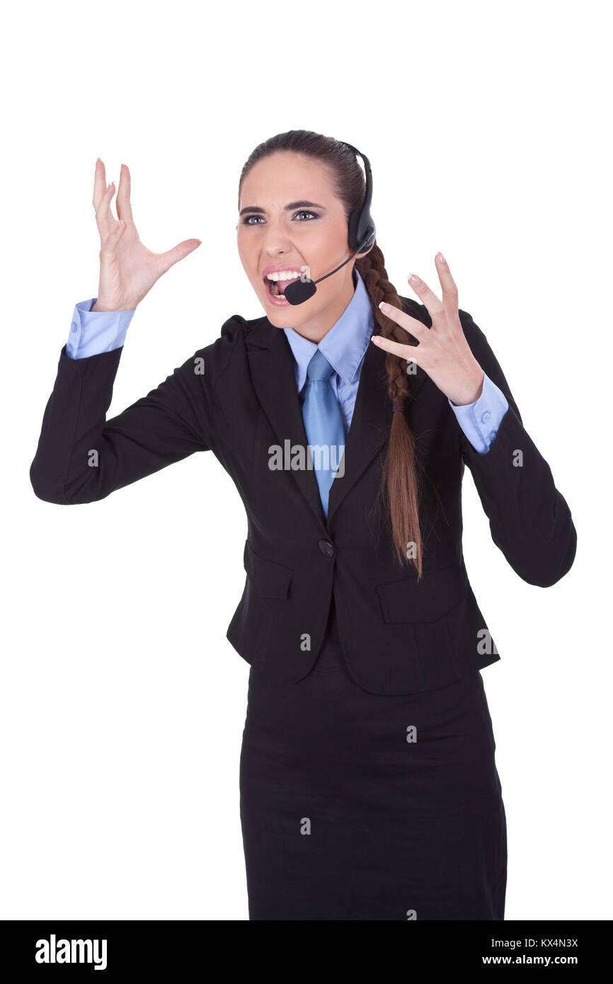 very angry businesswoman with headset yelling on microphone, isolated a ...
