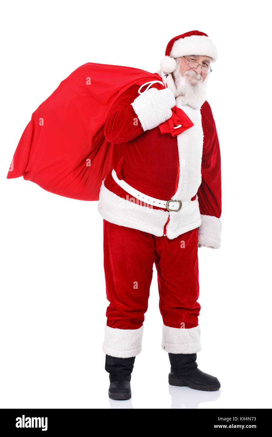 Santa Claus bringing presents in big red bag, isolated on white ...