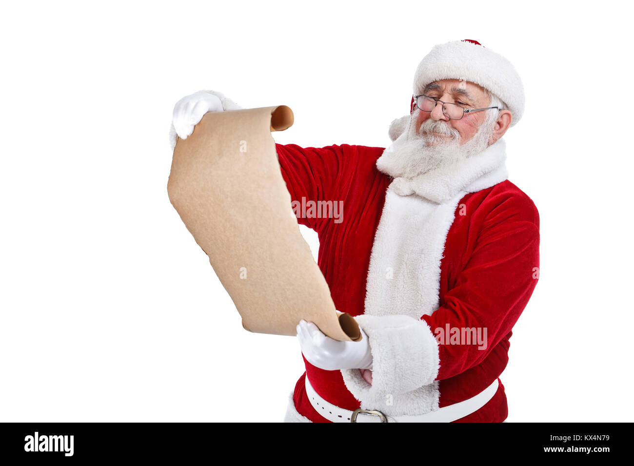 Santa Claus reading gift list, isolated on white background Stock Photo ...
