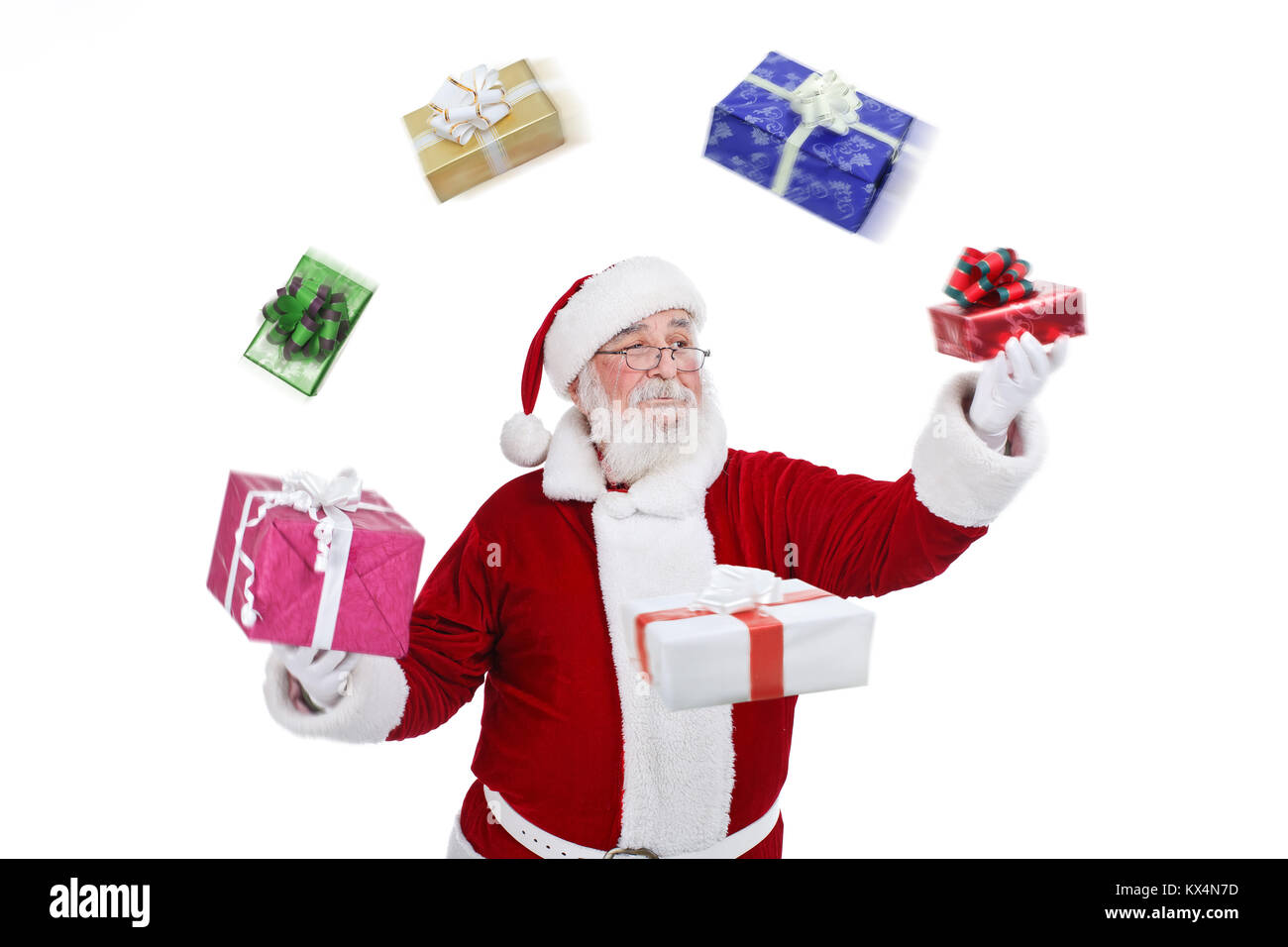 Santa Claus throwing and playing with presents, isolated on white ...