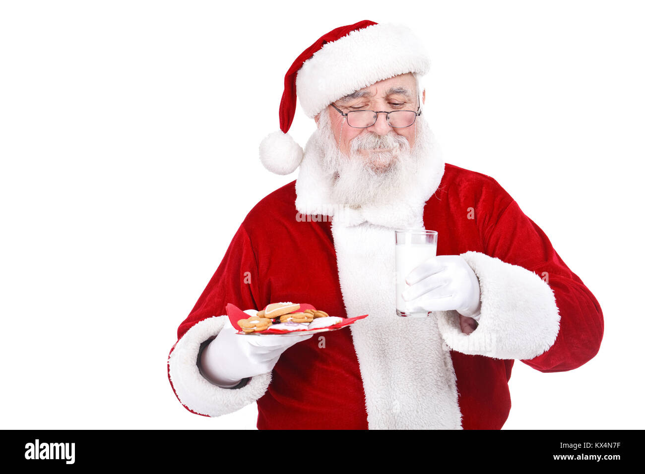Santa claus eating cookies glass hi-res stock photography and images ...