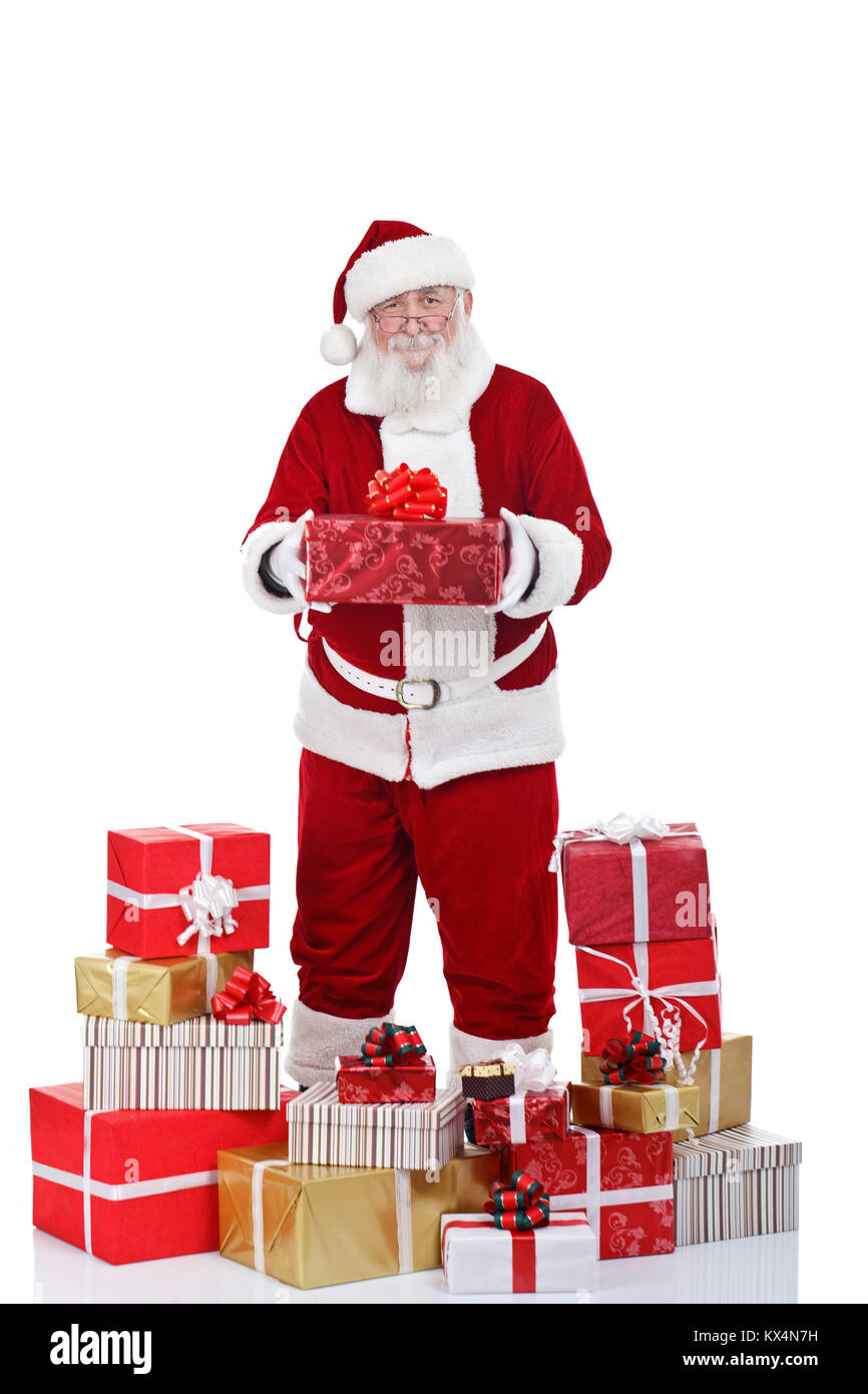 authentic Santa Claus with many gift boxes around him, isolated on ...