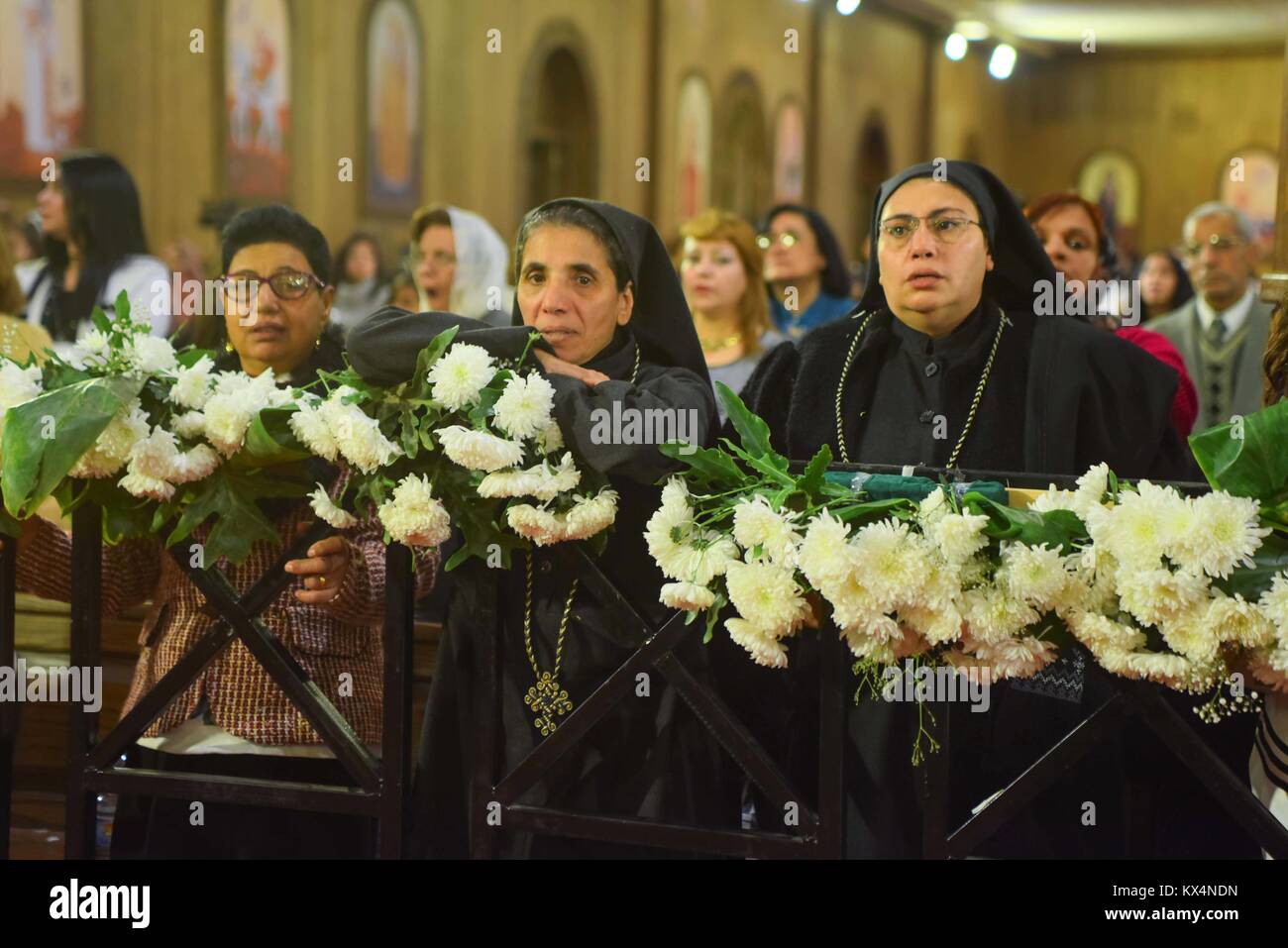 Cairo, Egypt. 6th Jan, 2018. Coptic Orthodox Christians attend the ...
