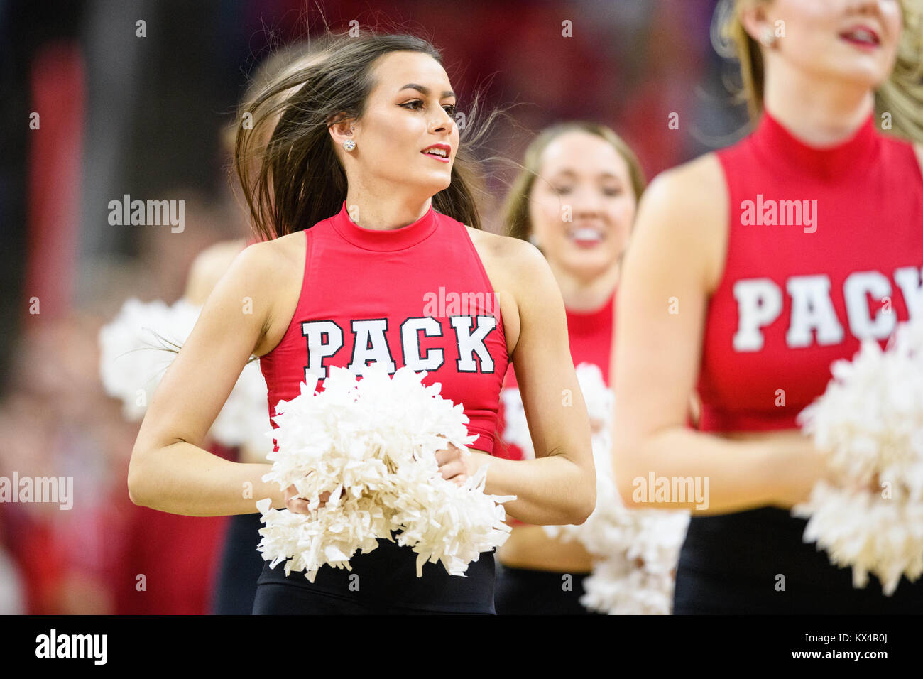 Nc state cheerleader during ncaa hi-res stock photography and images ...