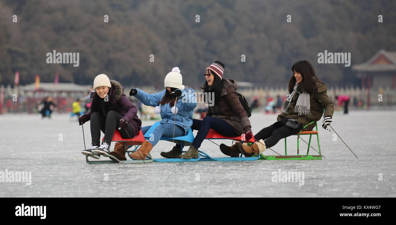 Beijing, China. 7th Jan, 2018. Tourists have fun in the ice rink at the ...