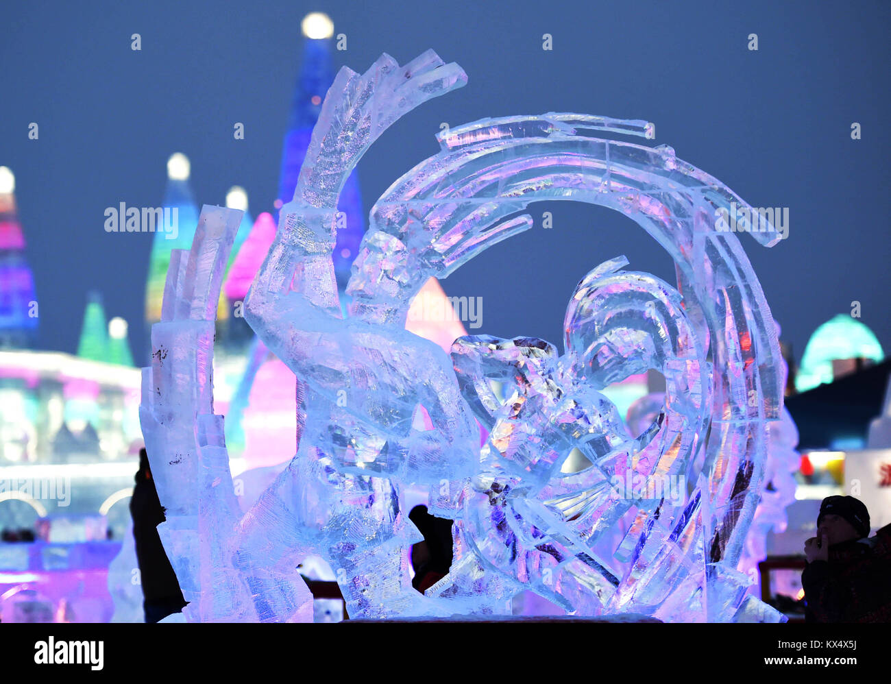 Harbin. 7th Jan, 2018. Ice sculptures are illuminated by coloured ...