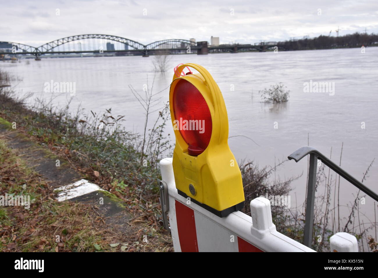 Cologne, Germany. 7th Jan, 2018. A red-and-white barrier with warning ...