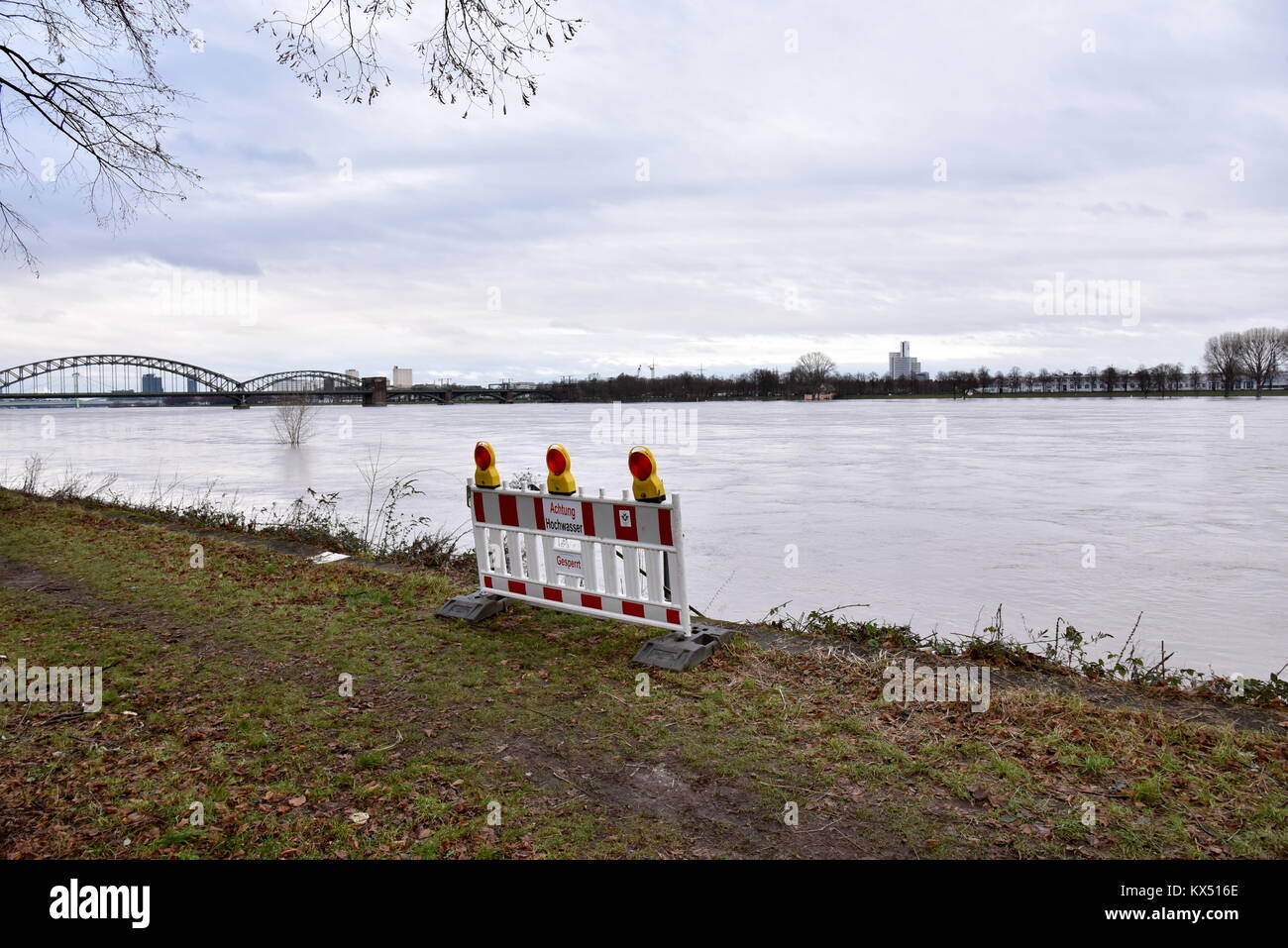 Cologne, Germany. 7th Jan, 2018. A red-and-white barrier with warning ...