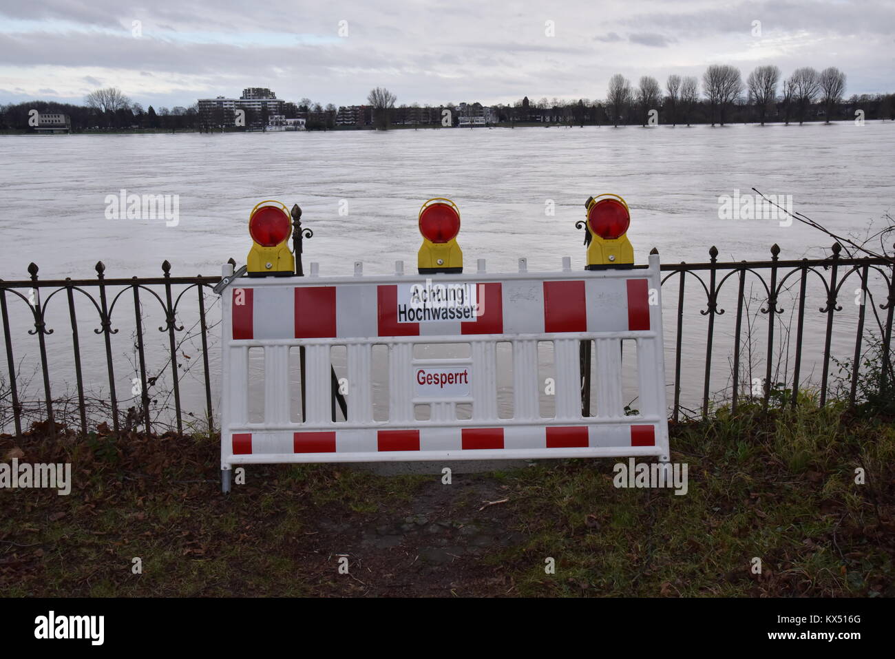 Cologne, Germany. 7th Jan, 2018. A red-and-white barrier with warning ...