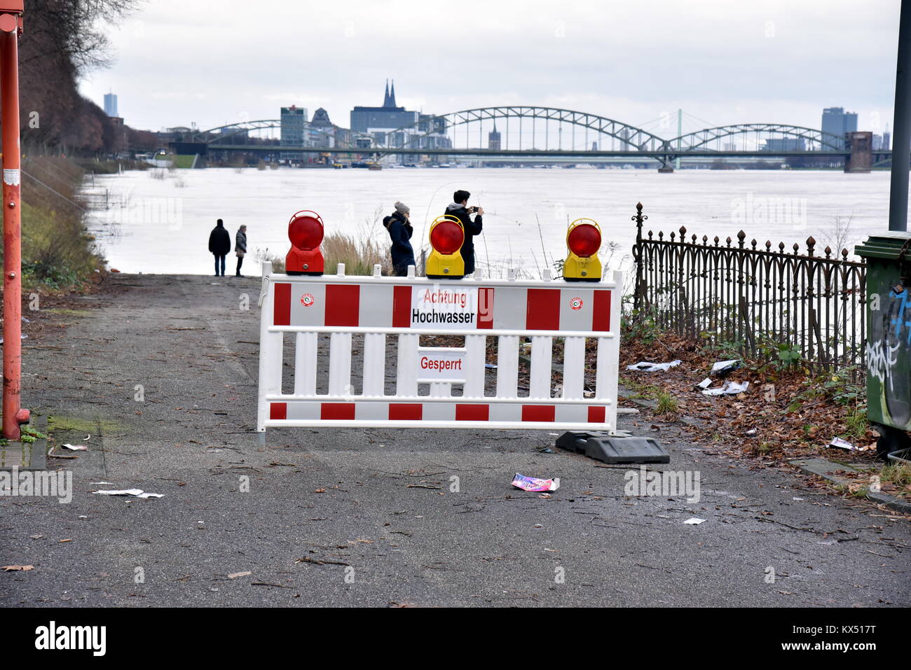 Cologne, Germany. 7th Jan, 2018. A red-and-white barrier with warning ...