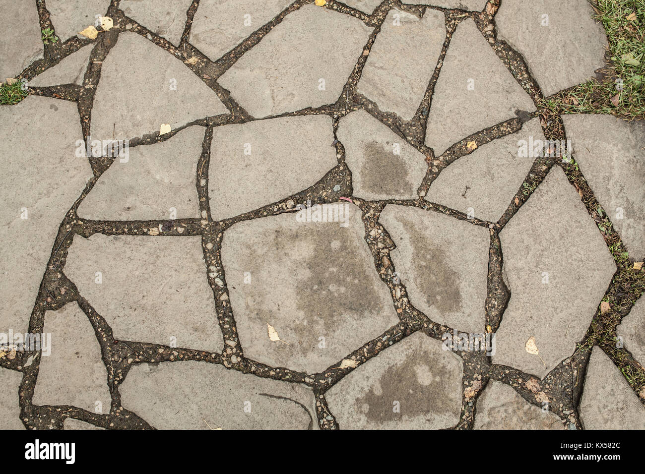 Stone floor pattern with a crack gray background close up Stock Photo ...
