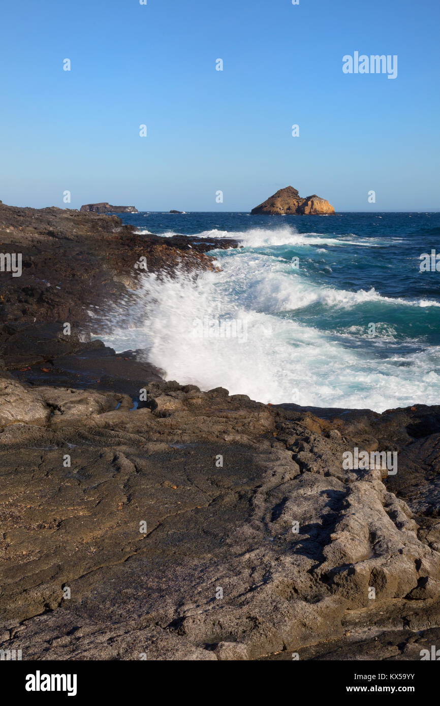 Galapagos Landscape - Waves breaking on the coast, Chinese Hat Island ...