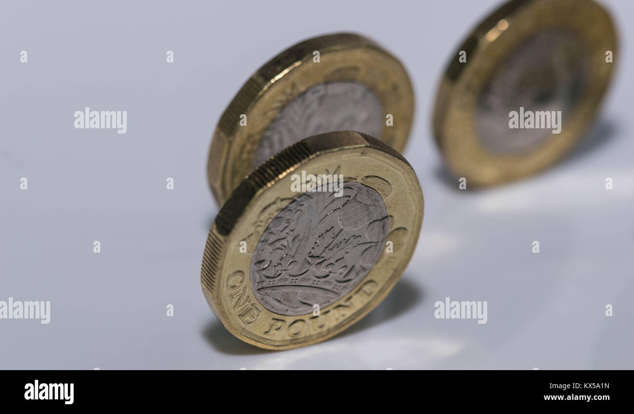 Close up focus photos of new United kingdom Pound coin isolated on a ...