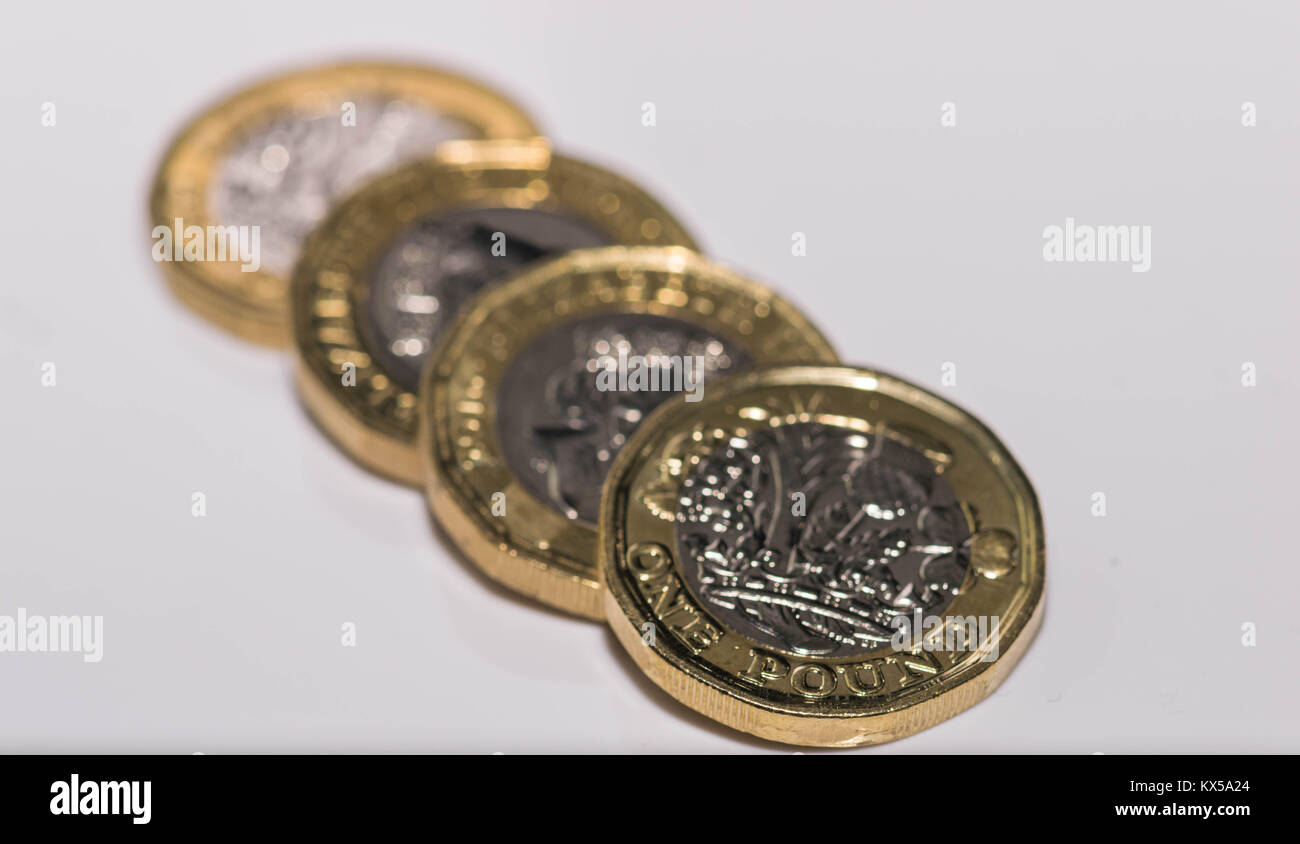 Close up focus photos of new United kingdom Pound coin isolated on a ...