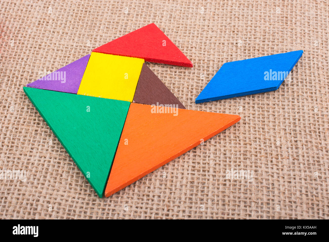 Colorful pieces of a square tangram puzzle Stock Photo - Alamy