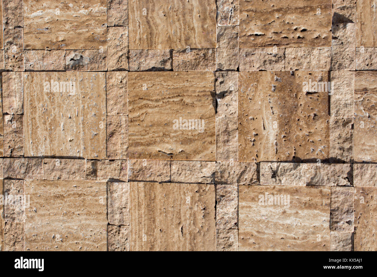 Decorative cubic stone wall as background texture Stock Photo - Alamy