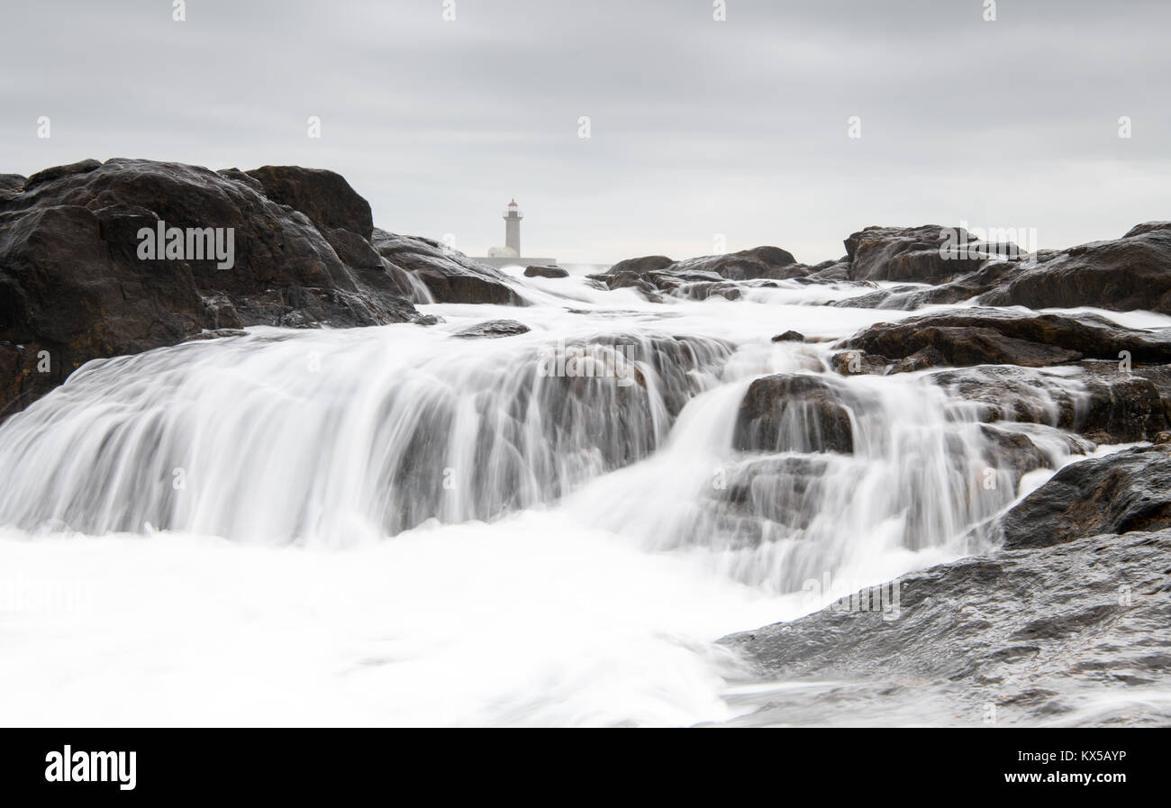 Porto Lighthouse in the surf Stock Photo - Alamy