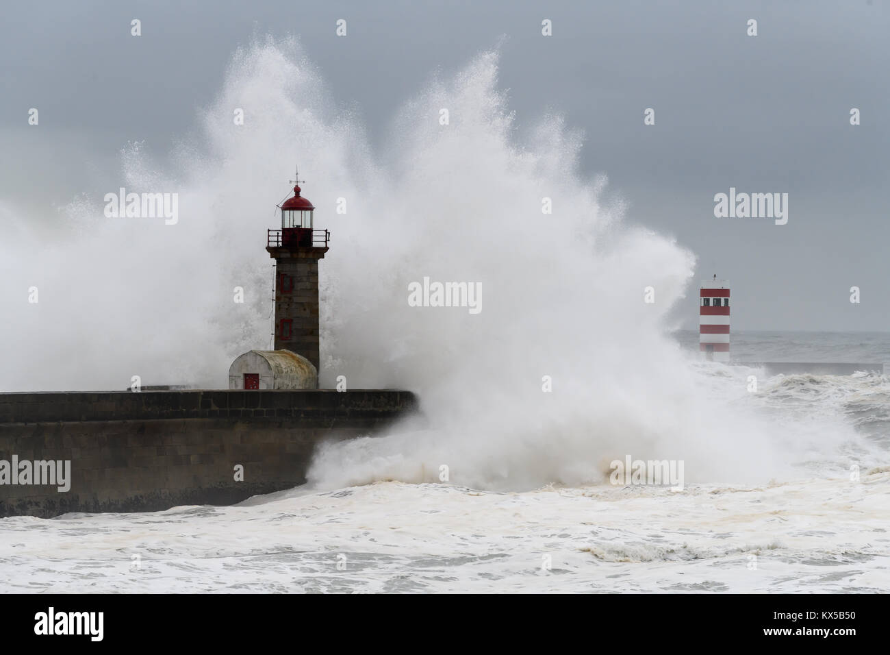 Lighthouse with huge waves Stock Photo - Alamy