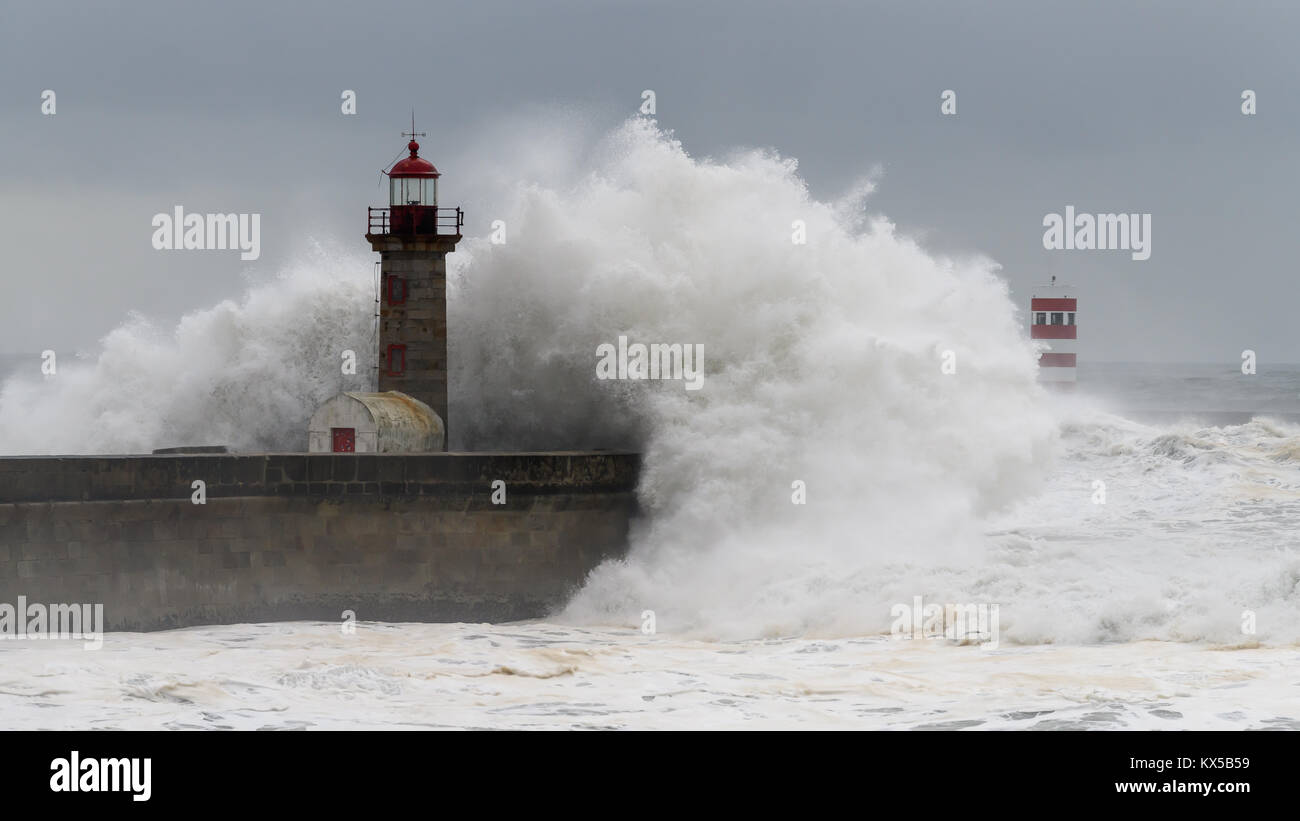 Lighthouse with huge waves Stock Photo - Alamy